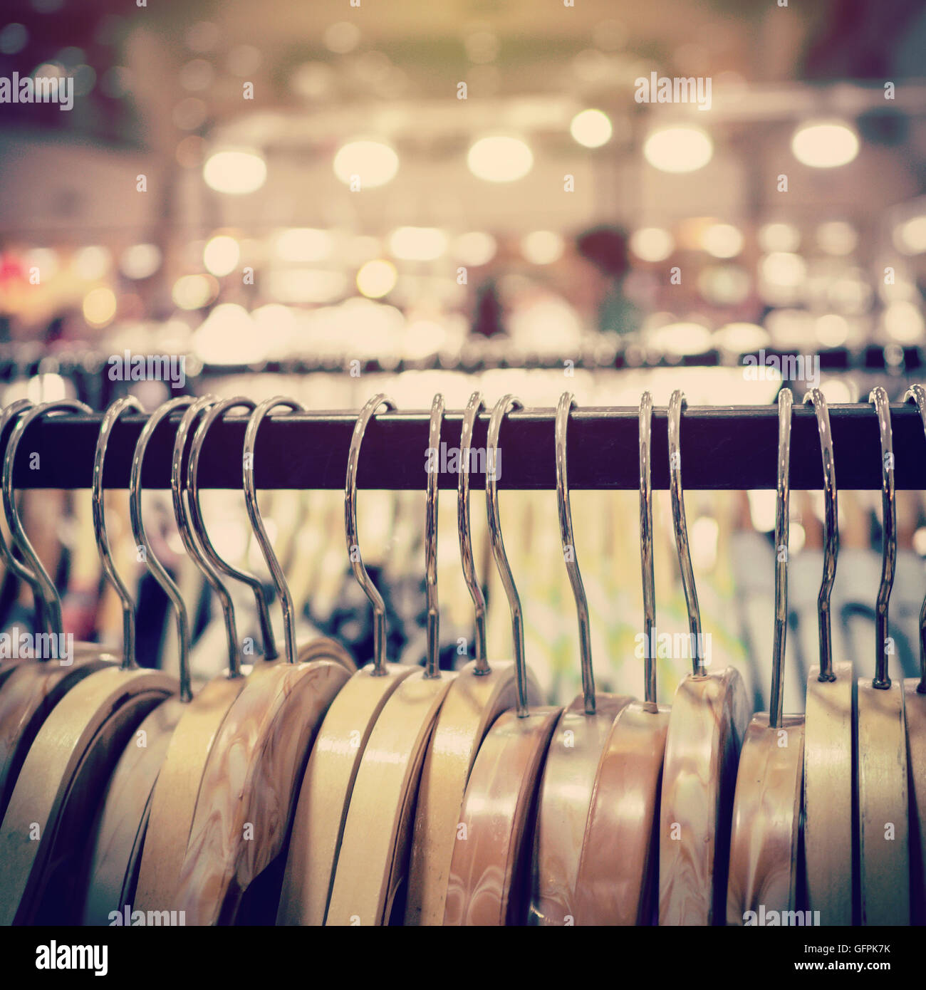 clothes hanger in shop with vintage toned Stock Photo - Alamy