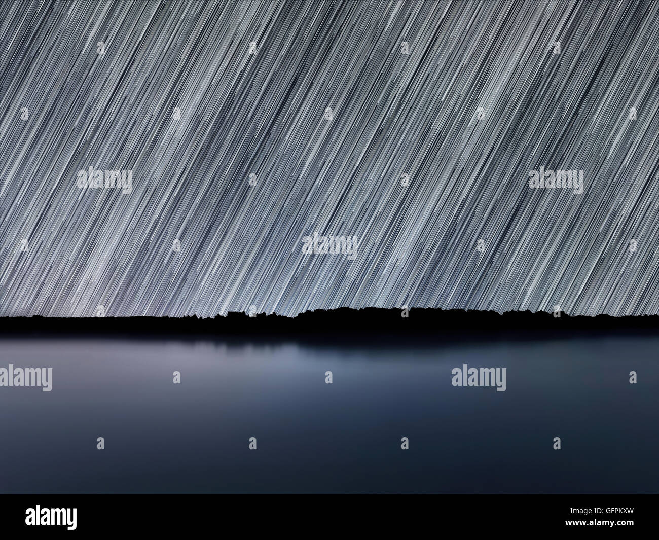 Star Trails, Beautiful Blue Night reflection on water Stock Photo - Alamy