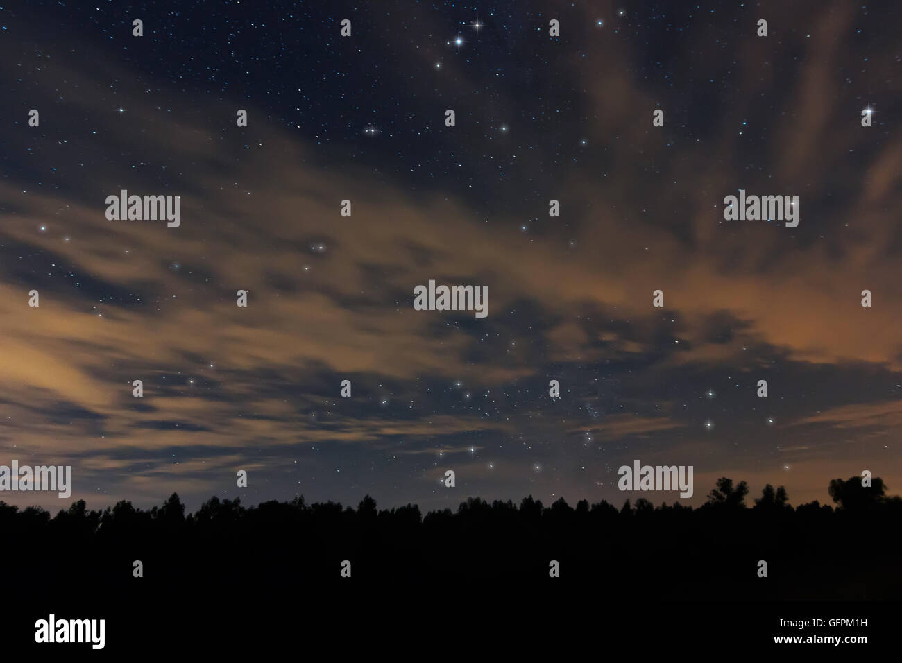 Beautiful night sky, with clouds and constellations, Aquarius, Aguila, Scutum, Ophiuchus ...