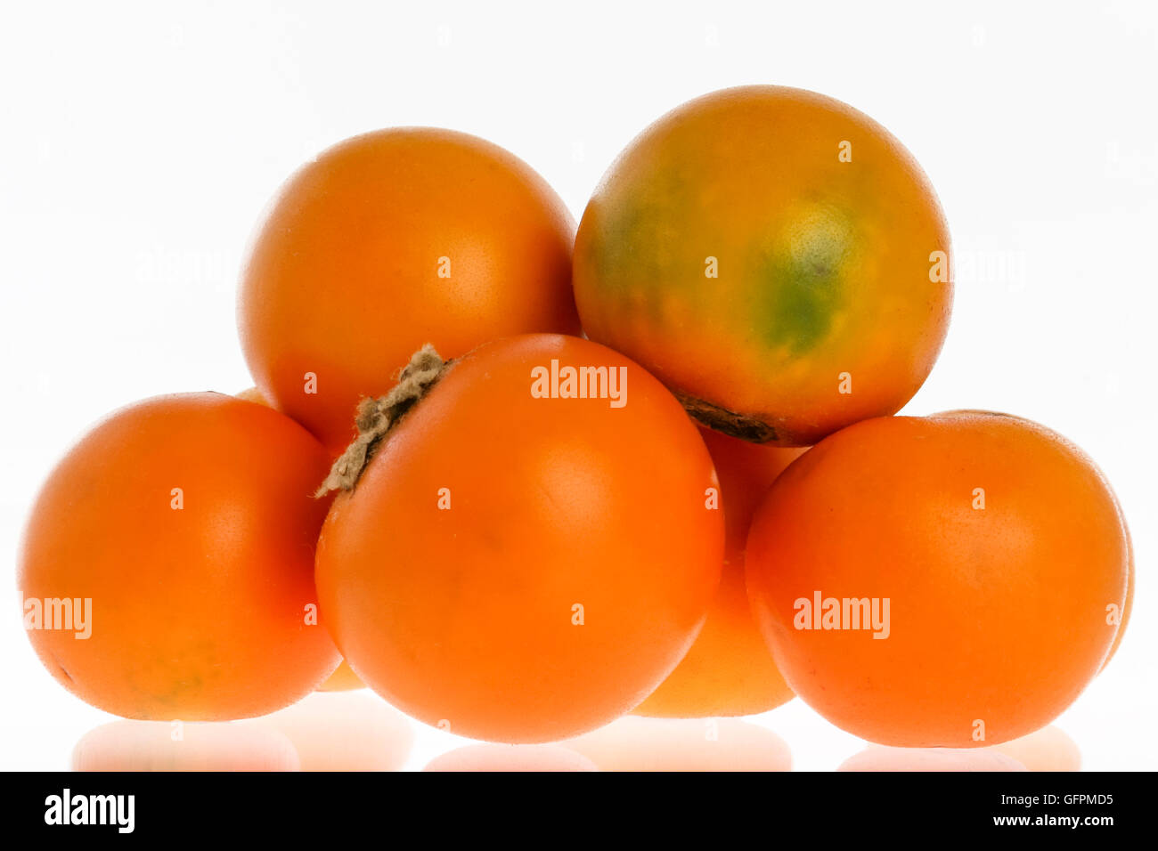 Lulo (Solanum quitoense) isolated in white background Stock Photo - Alamy