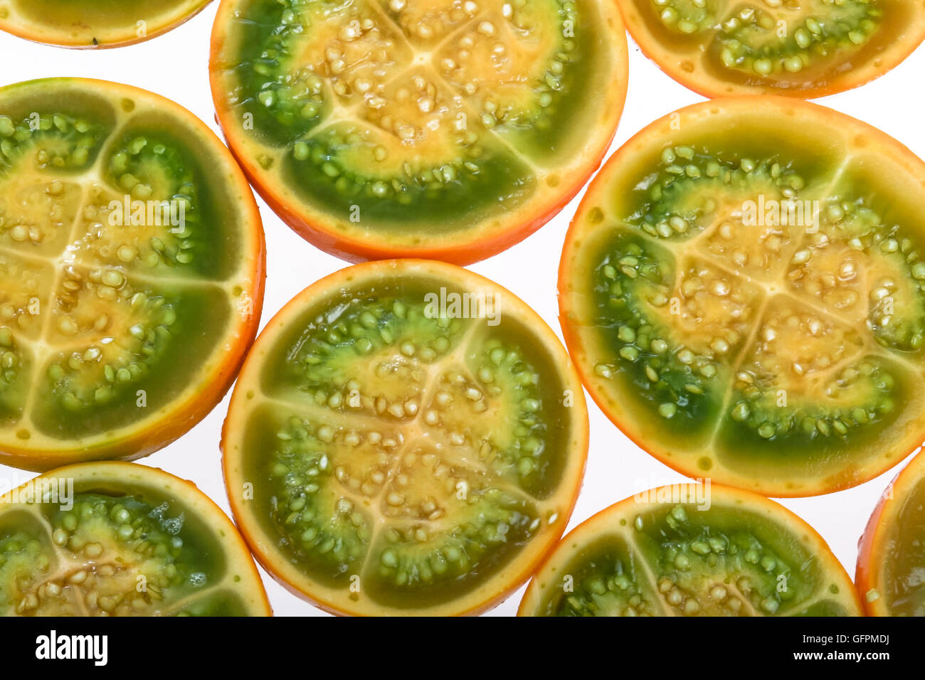 Lulo (Solanum quitoense) isolated in white background Stock Photo - Alamy