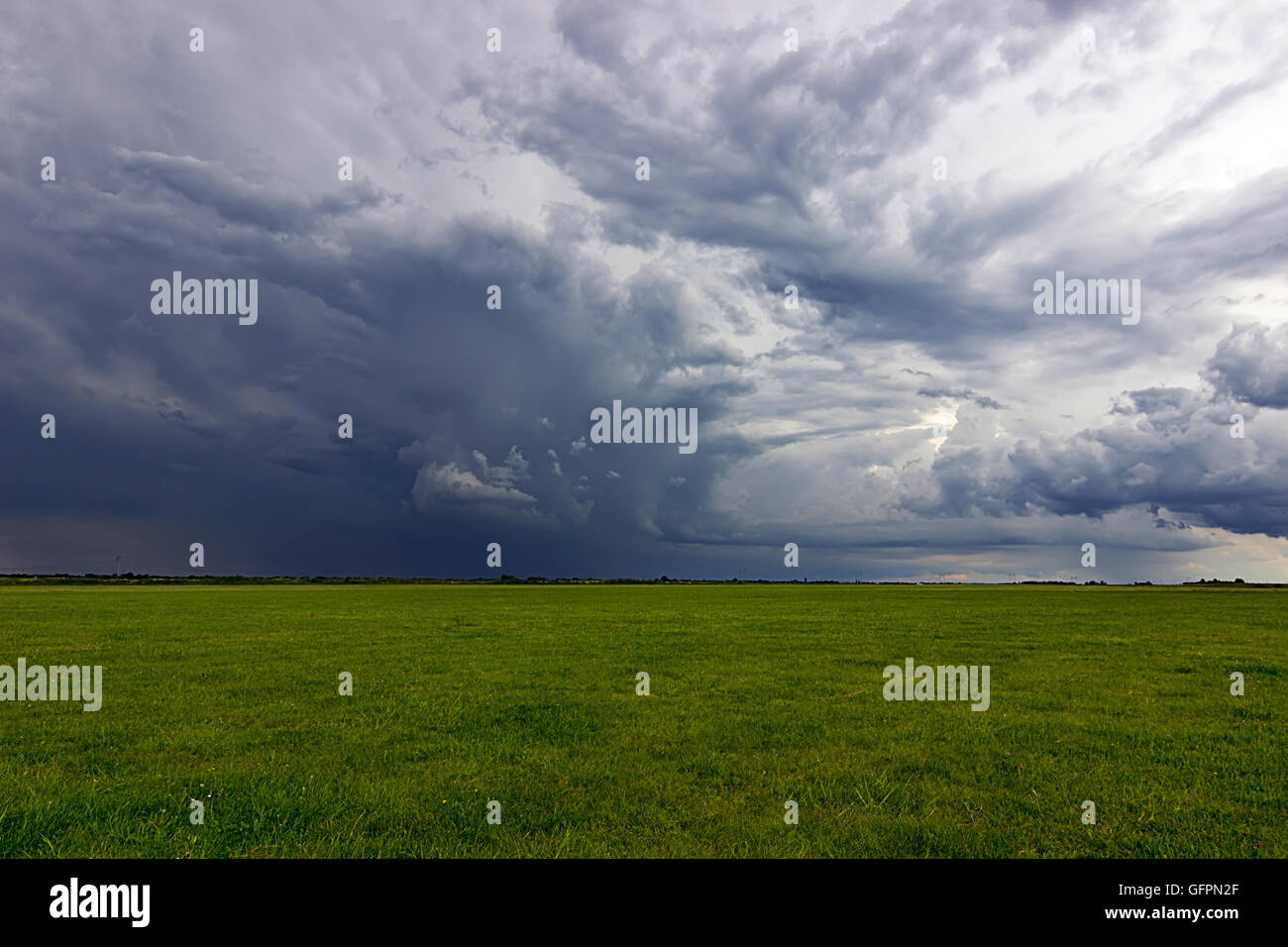 Supercell Storm And Green Grass