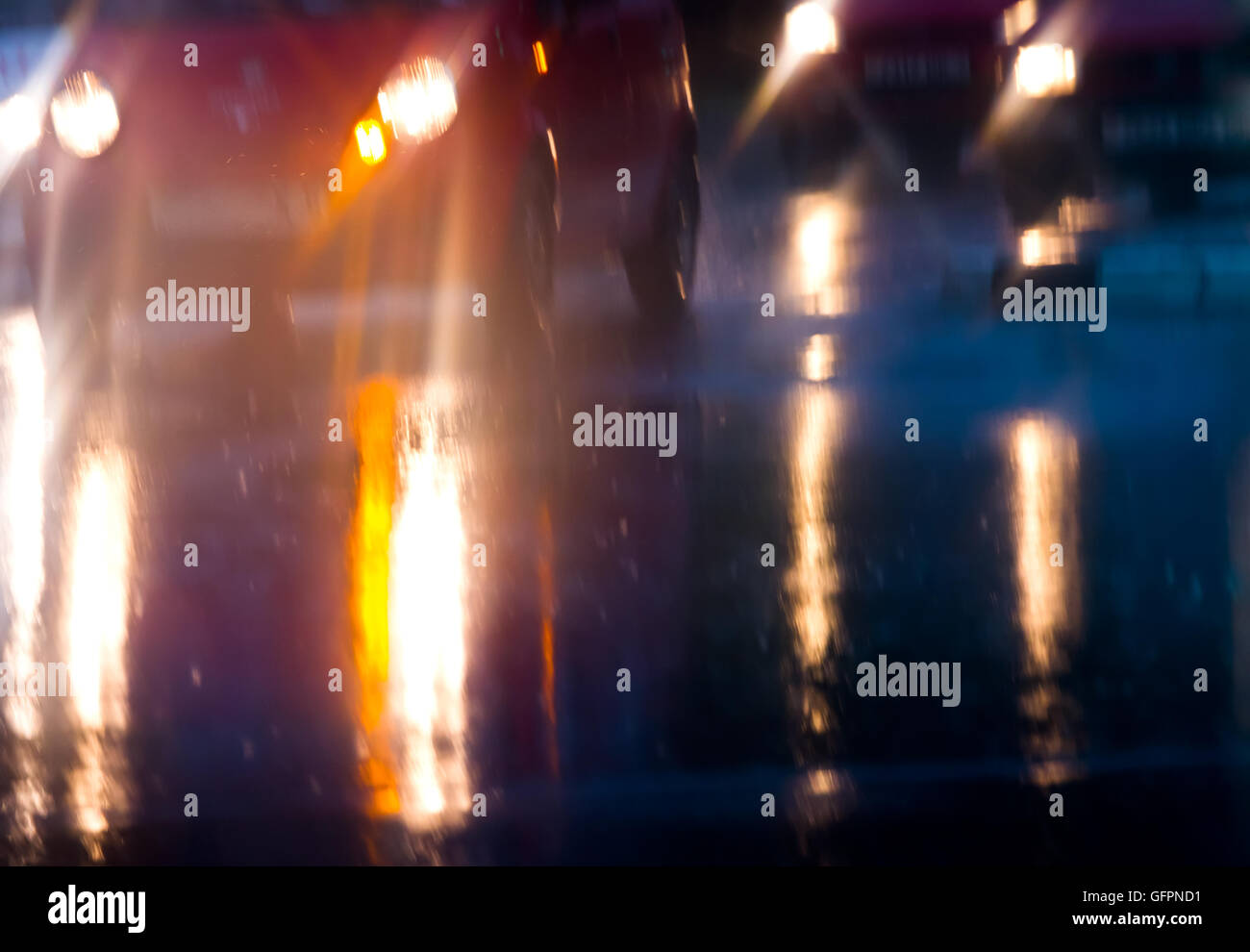Wet windshield and blurred rain traffic Stock Photo - Alamy