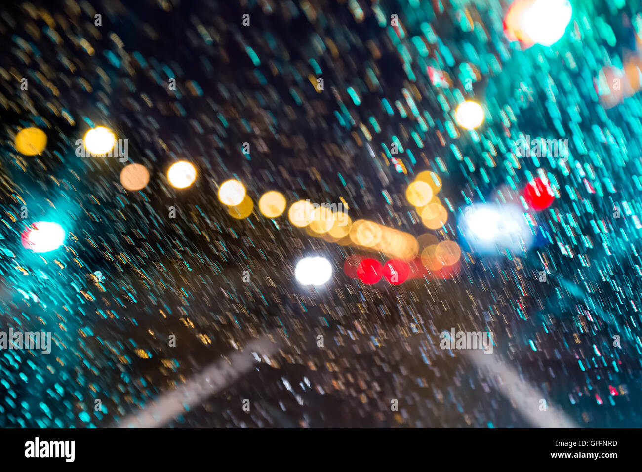 blurred traffic viewed through a car windscreen covered in rain Stock ...