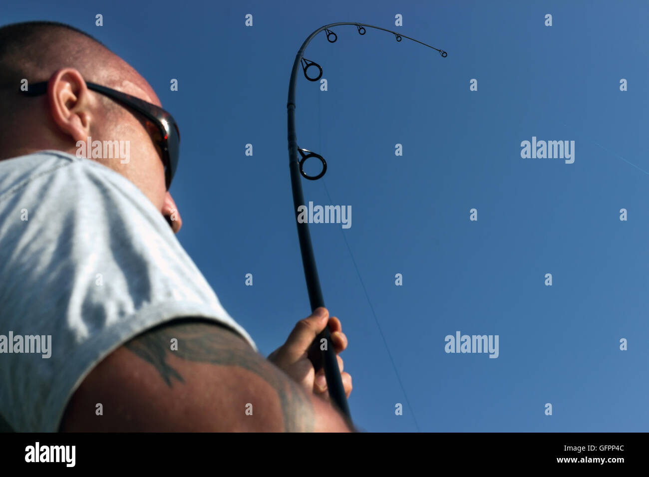 Holding rod hi-res stock photography and images - Alamy