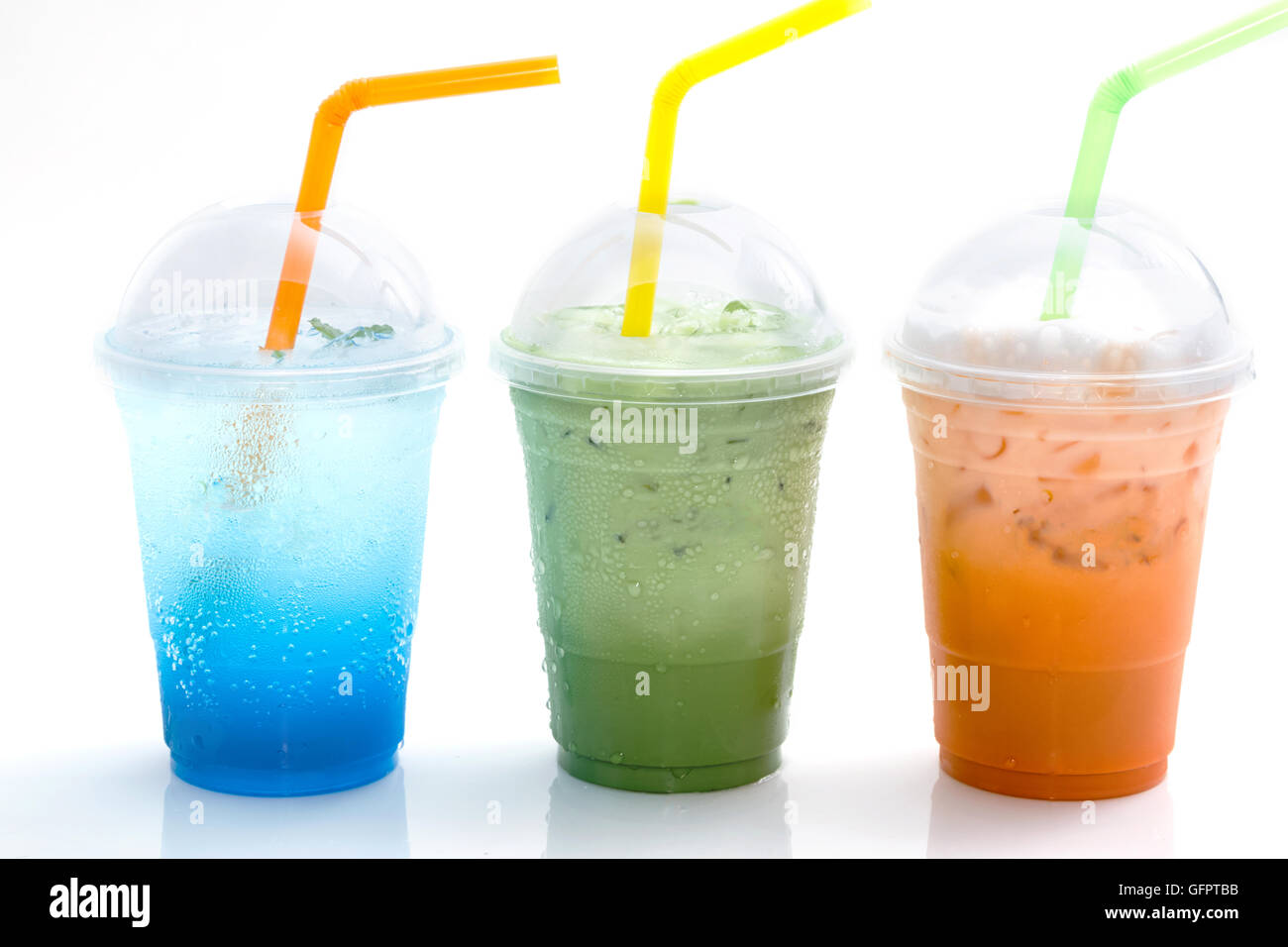 Blue italian soda and ice tea in takeaway cup isolated on white ...