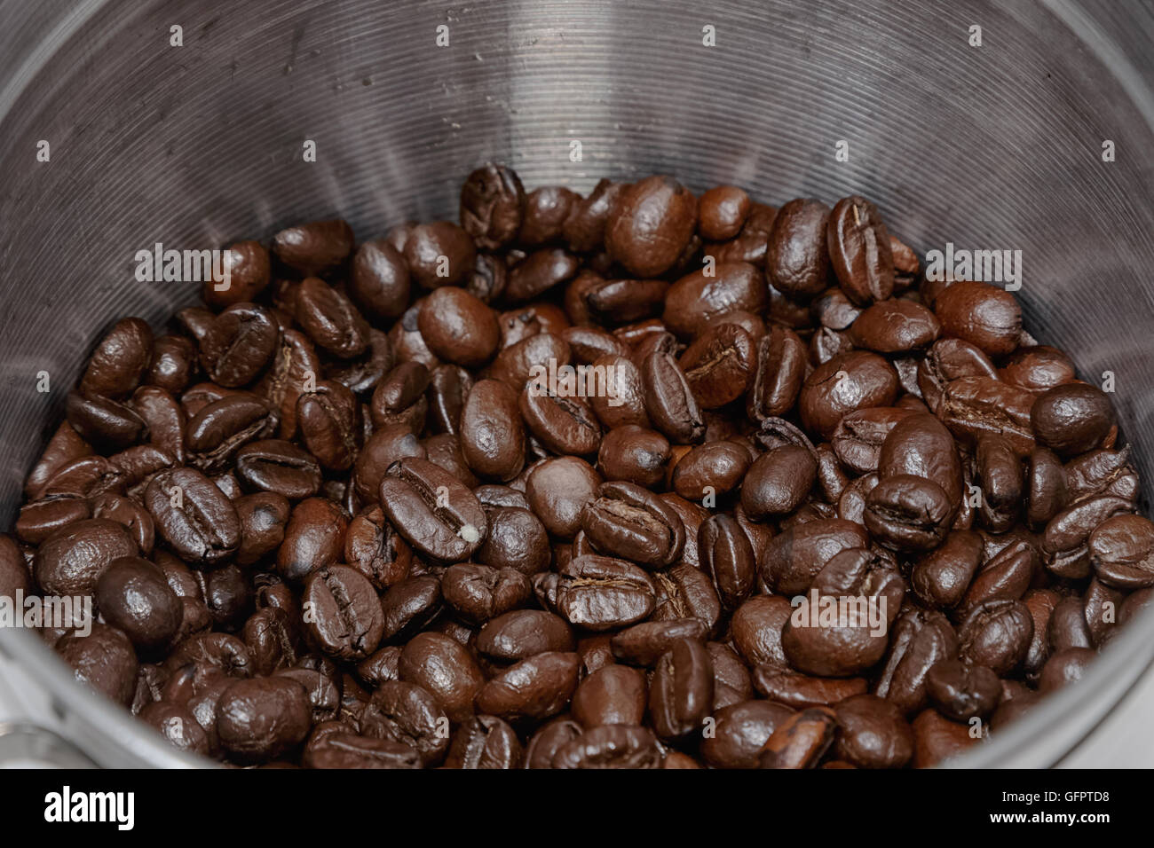 coffee beans in the silver pot Stock Photo - Alamy