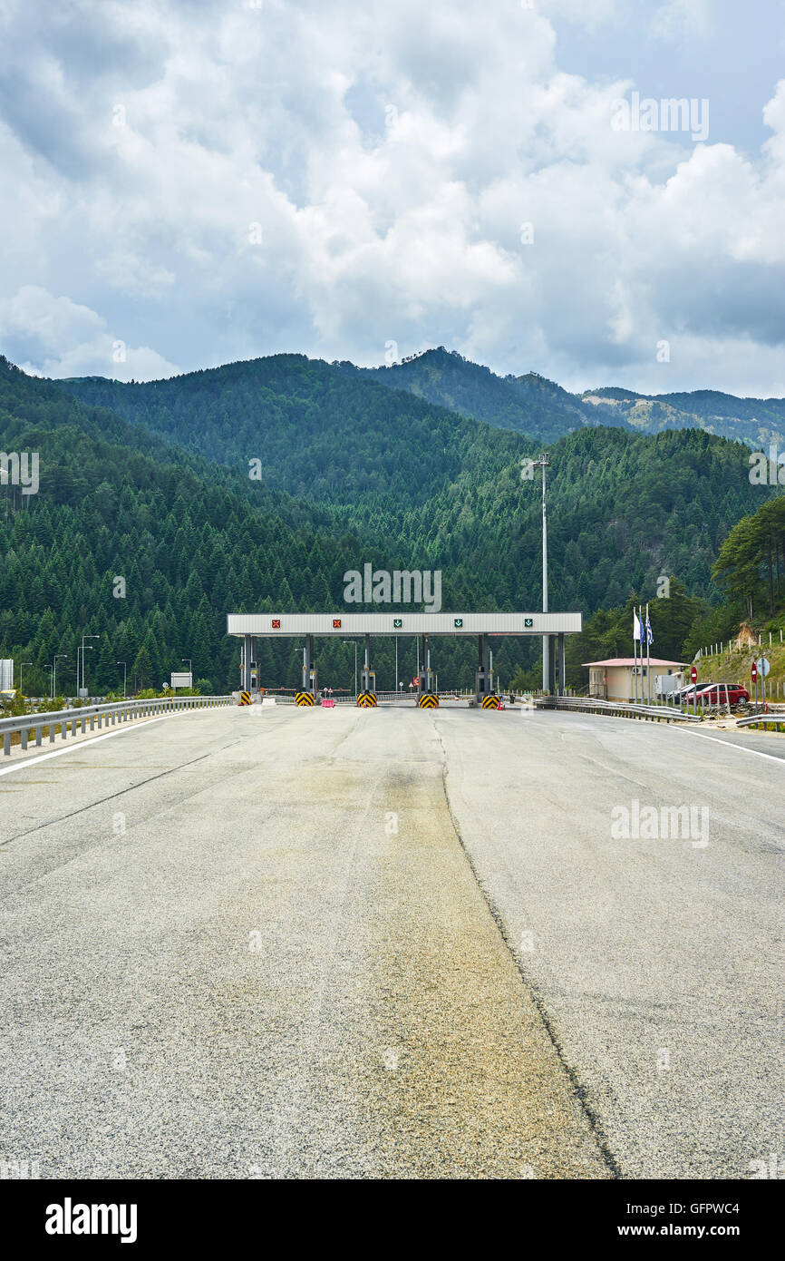 Multiple lane toll barrier in Greee Stock Photo - Alamy