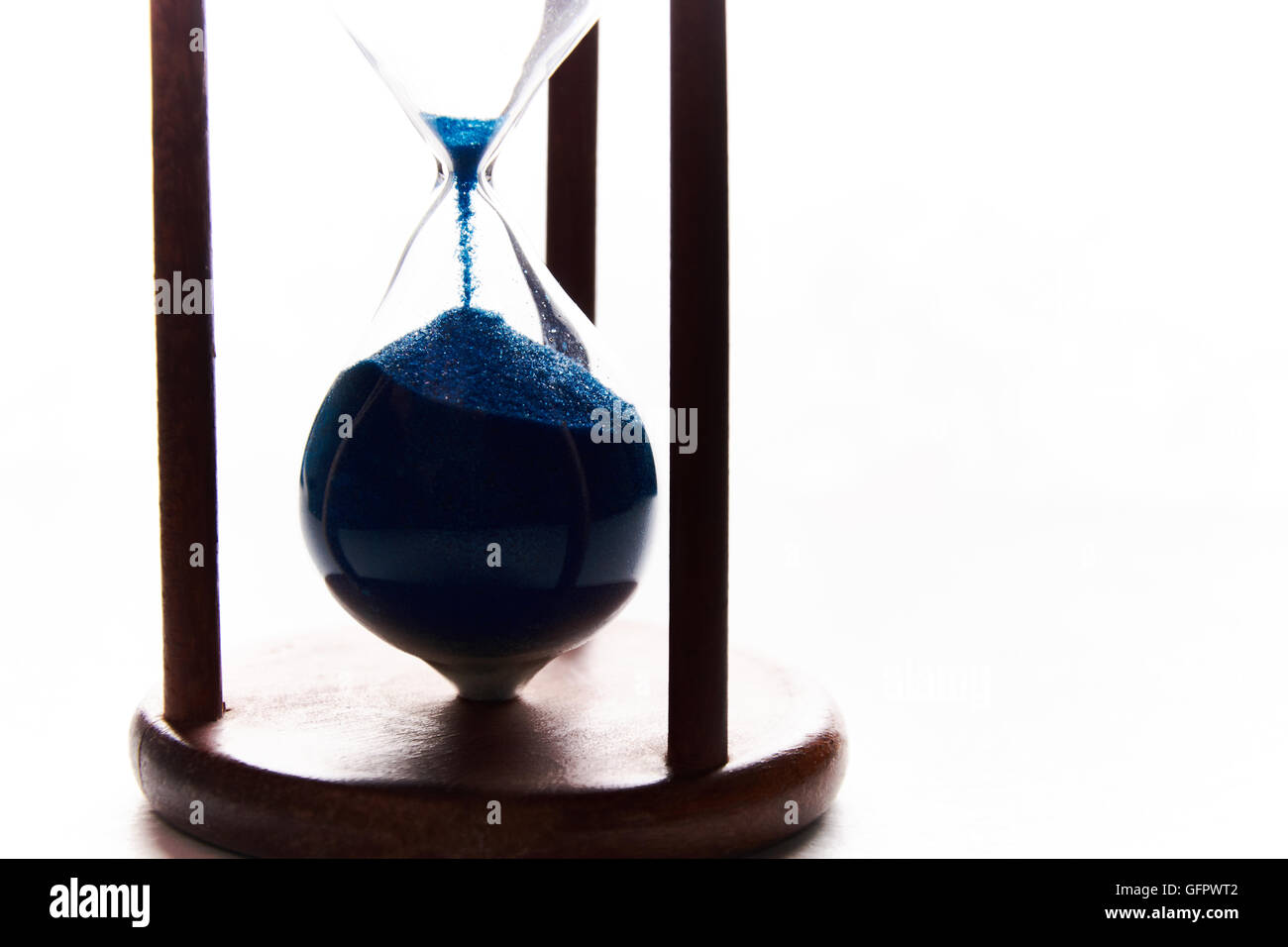 A sand glass isolated on white background Stock Photo - Alamy
