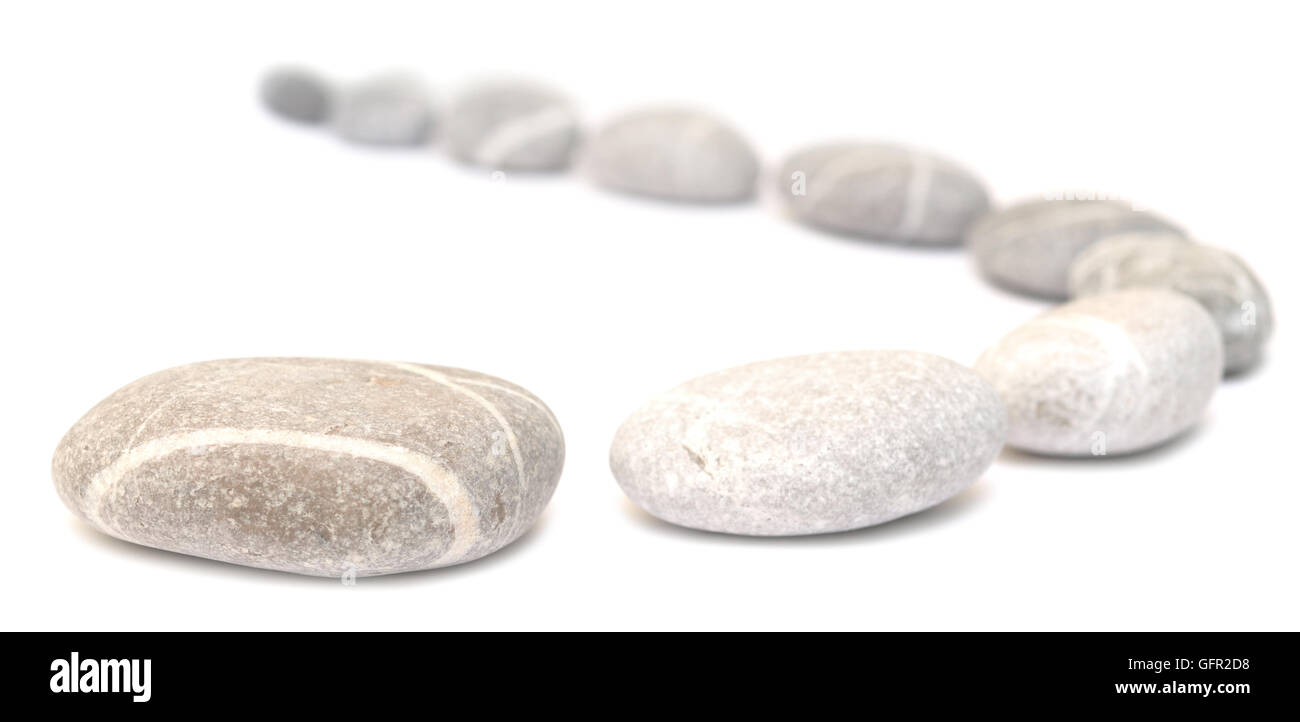 row of pebbles isolated on white background Stock Photo - Alamy