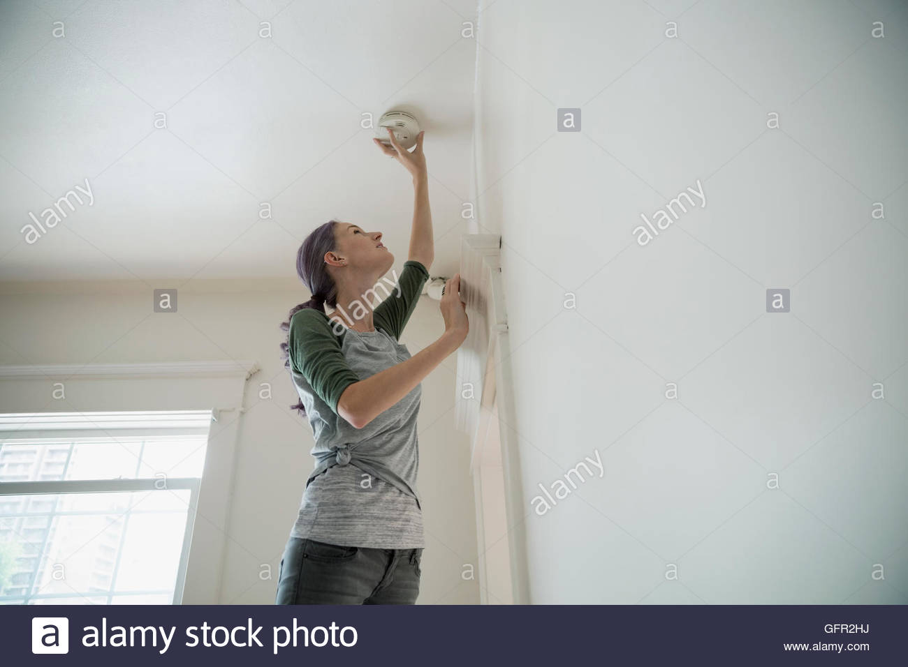 Woman ceiling hi-res stock photography and images - Alamy