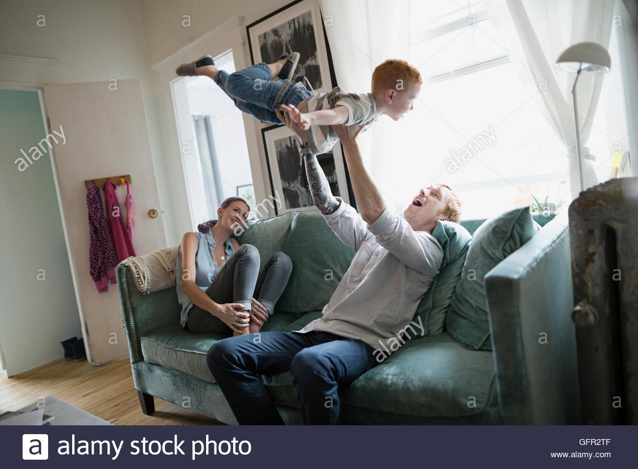 Flying sofa hi-res stock photography and images - Alamy