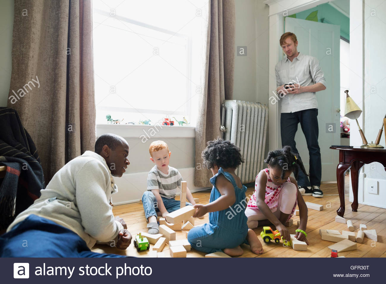 Children playing date hi-res stock photography and images - Alamy