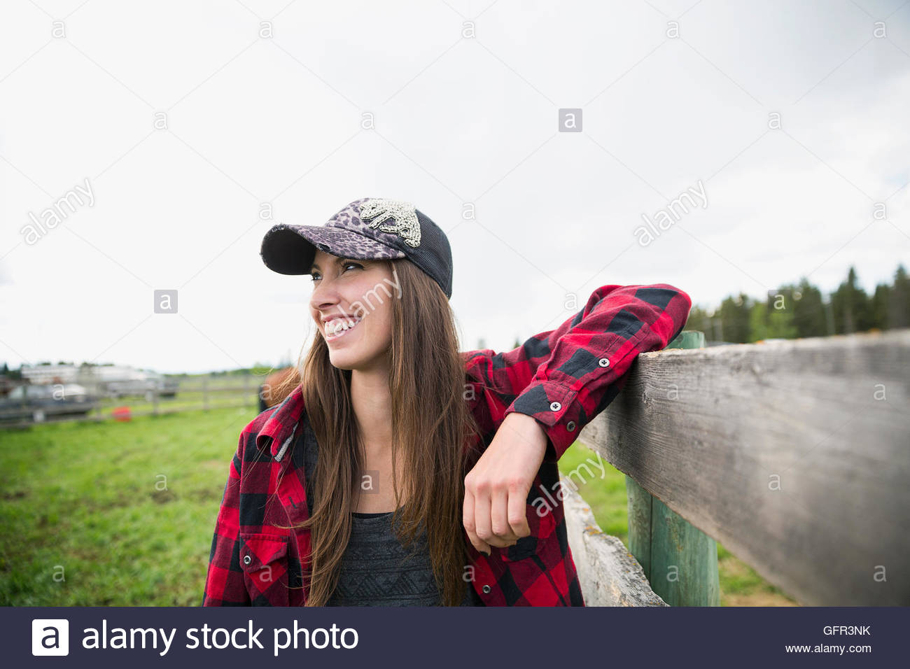 Leaning on fence hi-res stock photography and images - Alamy