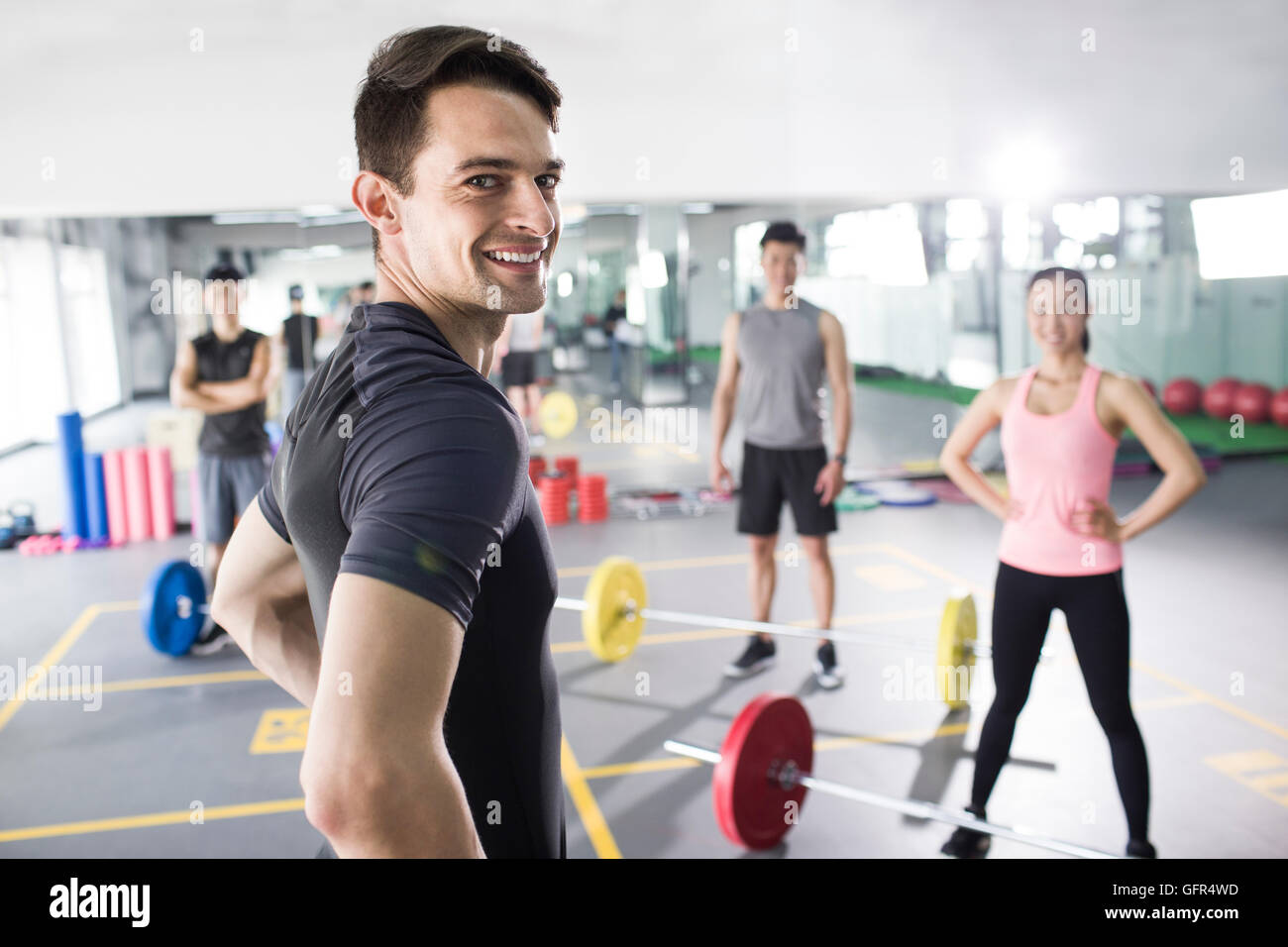 Portrait of fitness instructor at gym Stock Photo - Alamy
