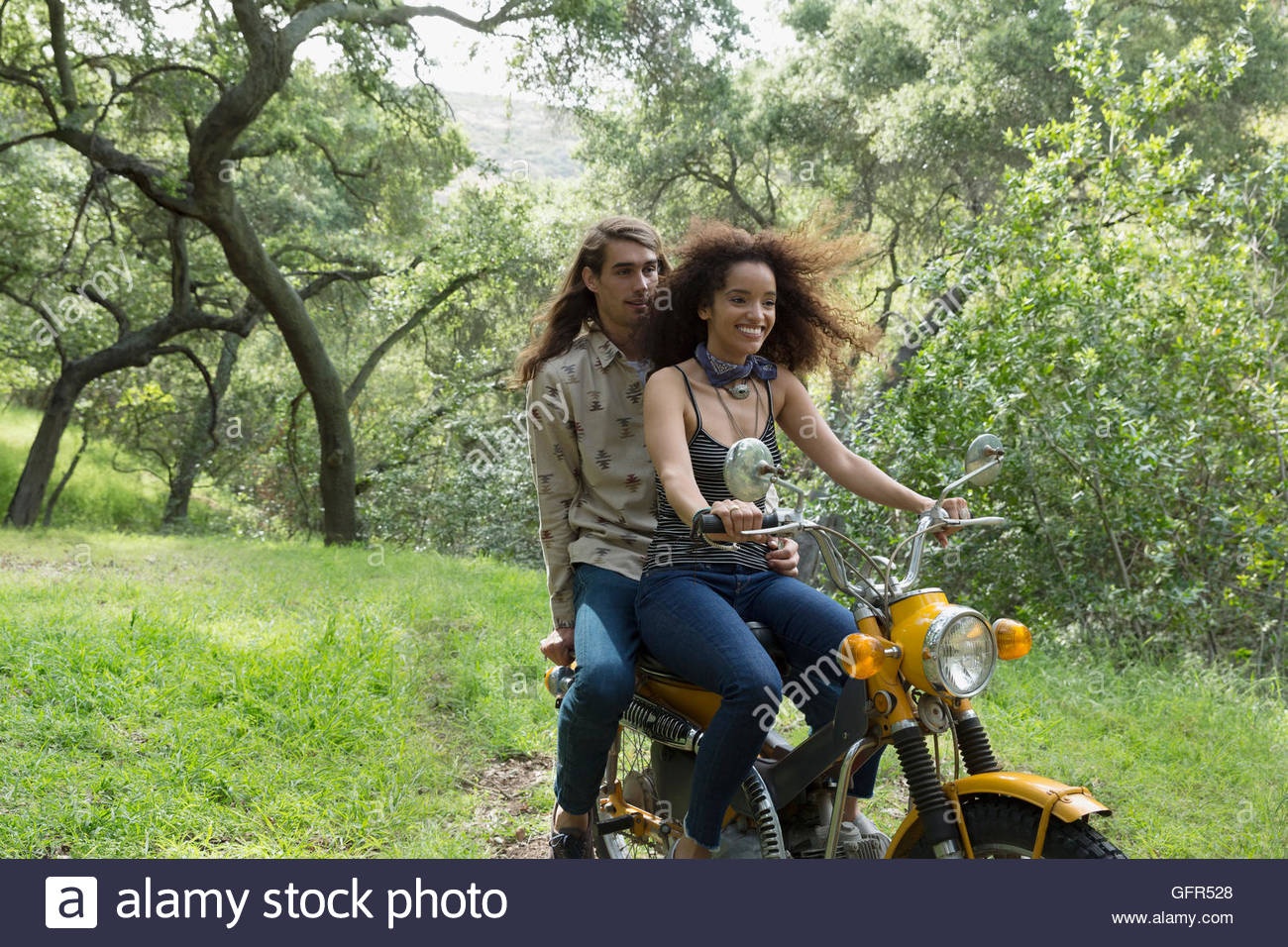 Couple riding on motorcycle hi-res stock photography and images - Alamy