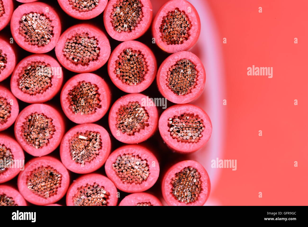 Group of red electric cables closeup Stock Photo - Alamy