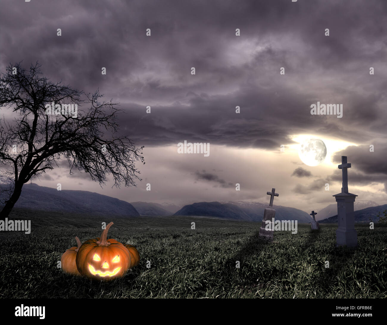 Spooky Halloween graveyard with pumpkin Stock Photo - Alamy