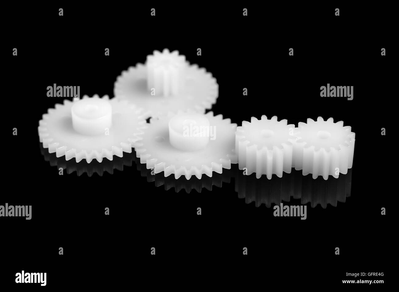 Close up photograph of plastic gears on black background Stock Photo ...