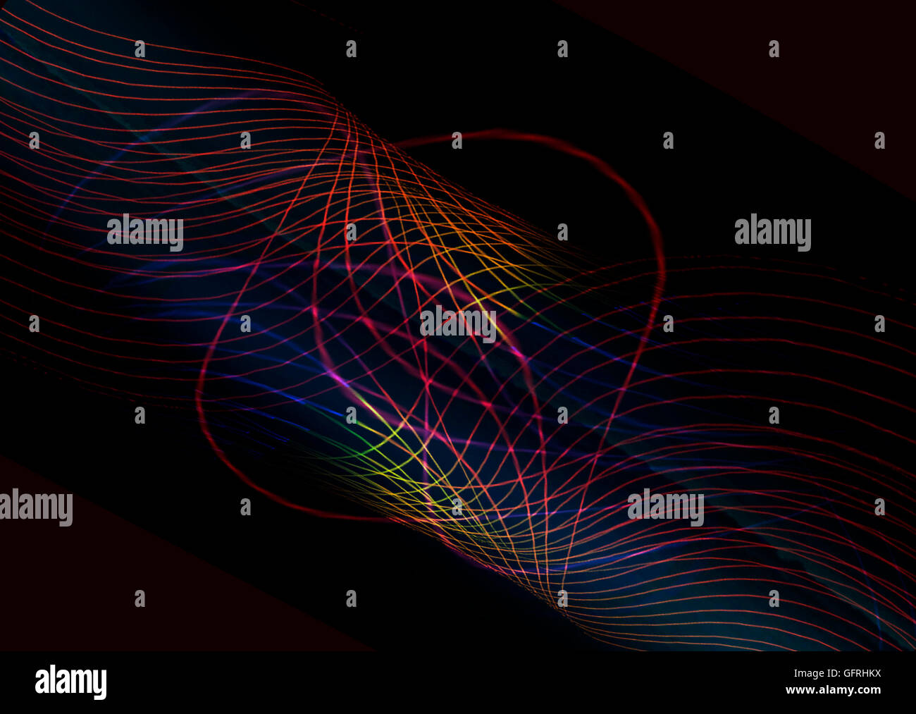 Twisted radiant lines on black background Stock Photo - Alamy