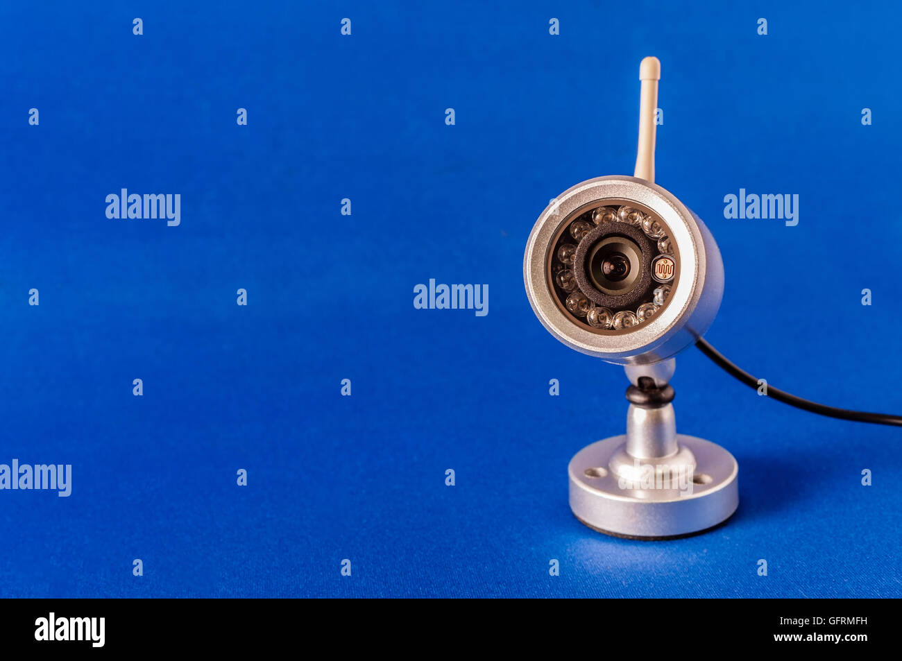 Wireless CCTV camera on a blue background with copy space Stock Photo ...