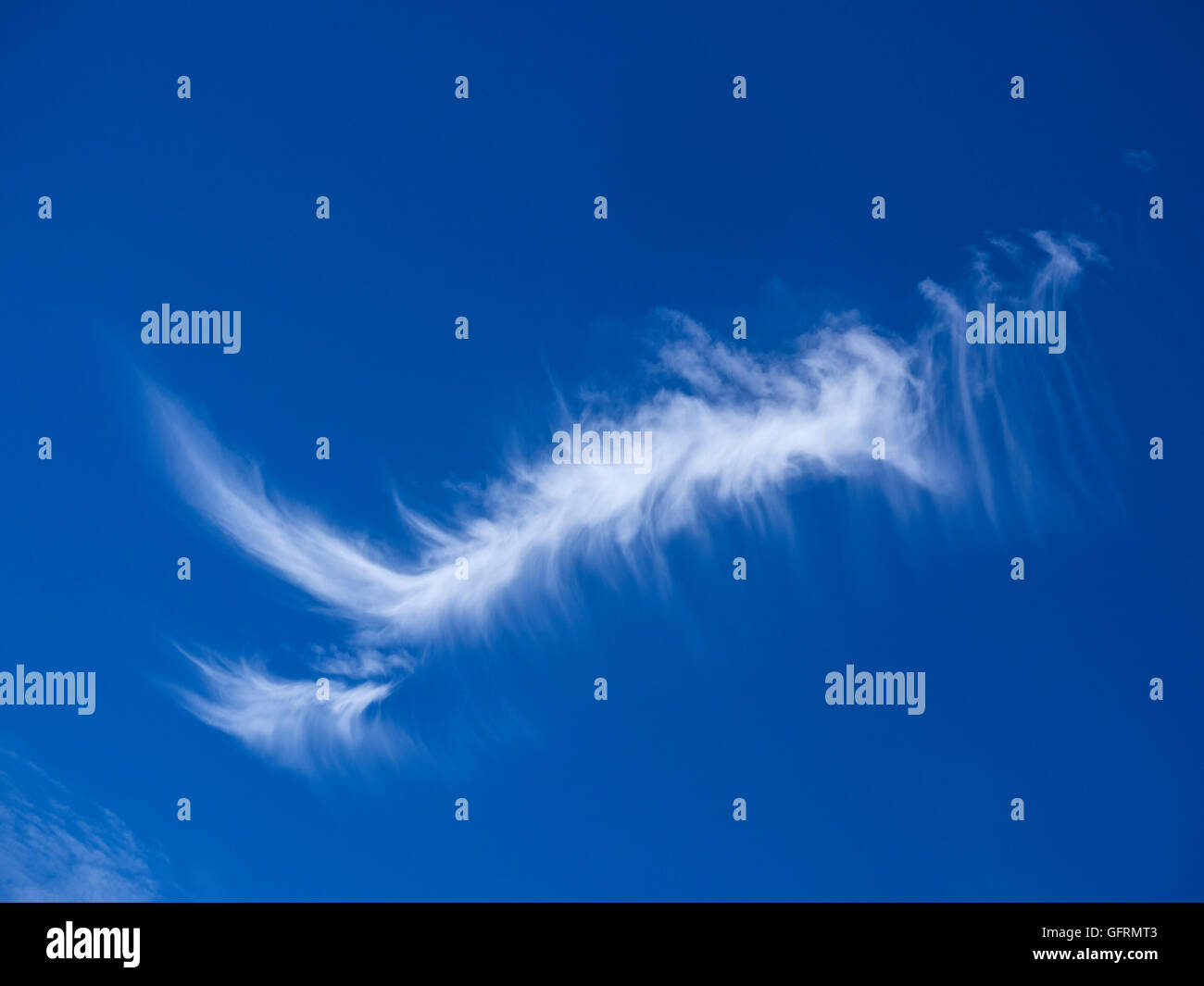 Cirrus Cloud against a blue sky taken from the Isle of Wight, England ...