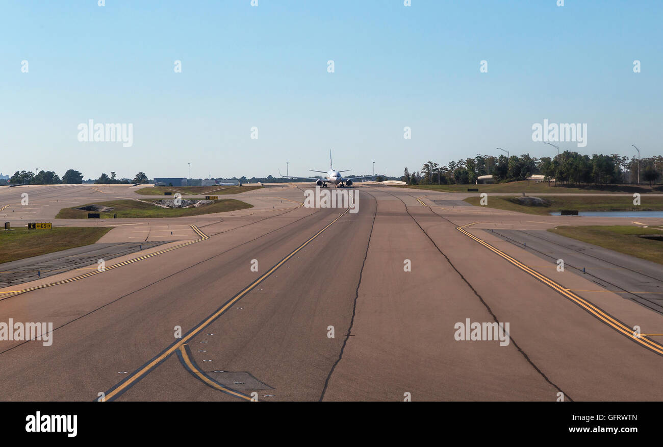 Runway marked with a black wheel marks on the runway Stock Photo - Alamy