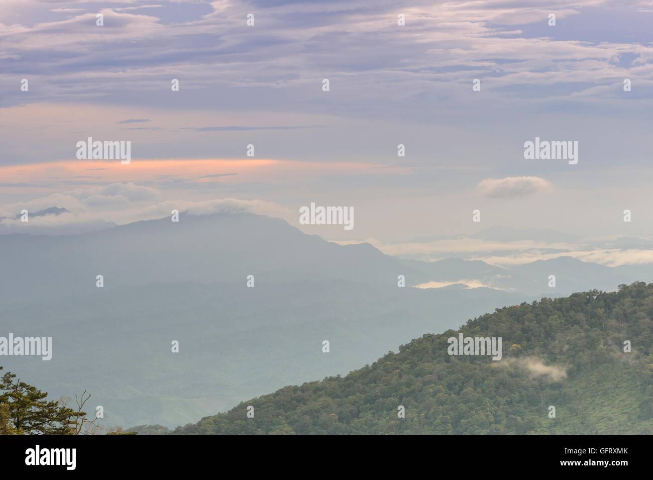 Beautiful sunset tropical mountain mist in rainforest, Thailand Stock ...