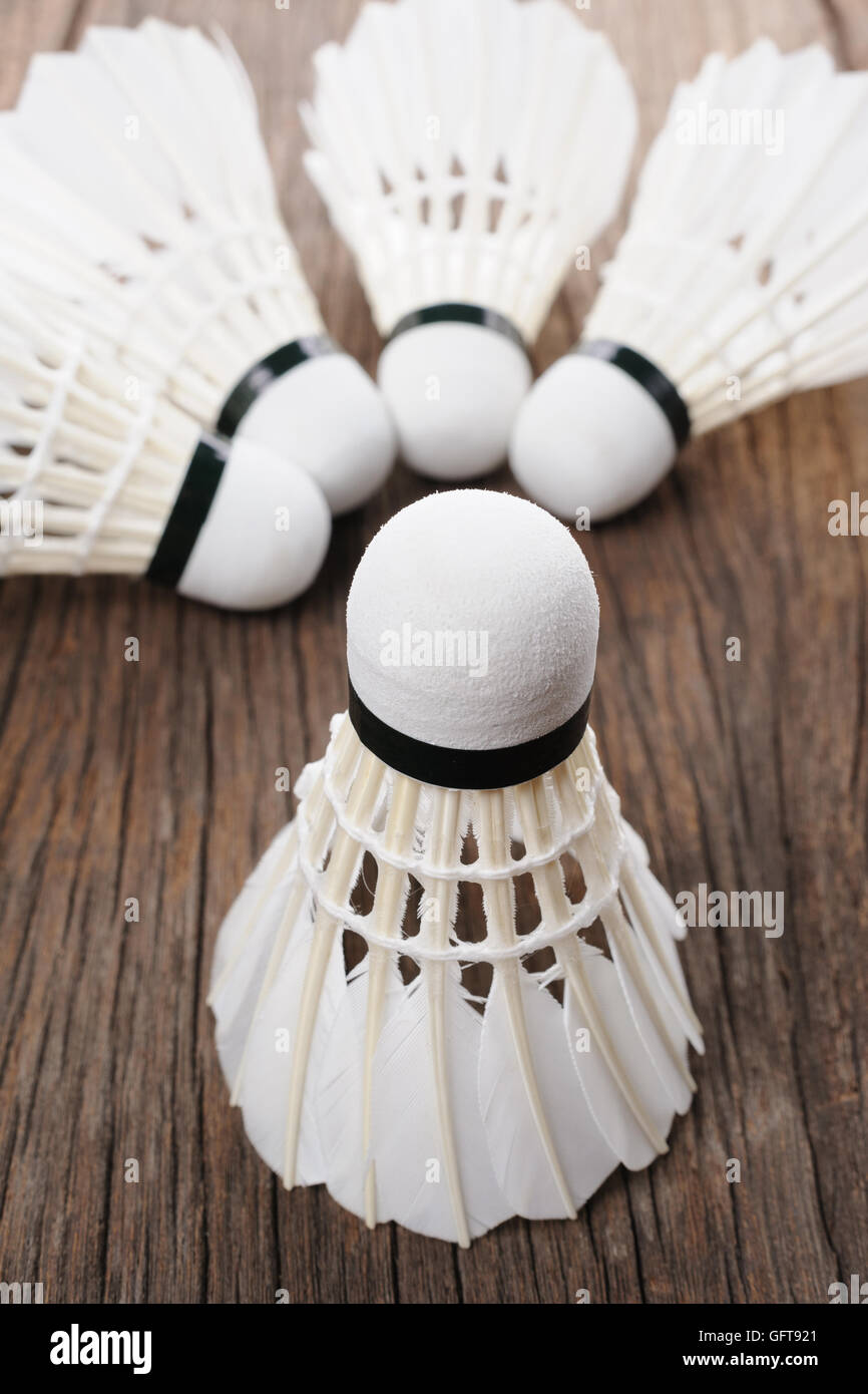 closeup shuttlecocks isolated on wooden table Stock Photo - Alamy
