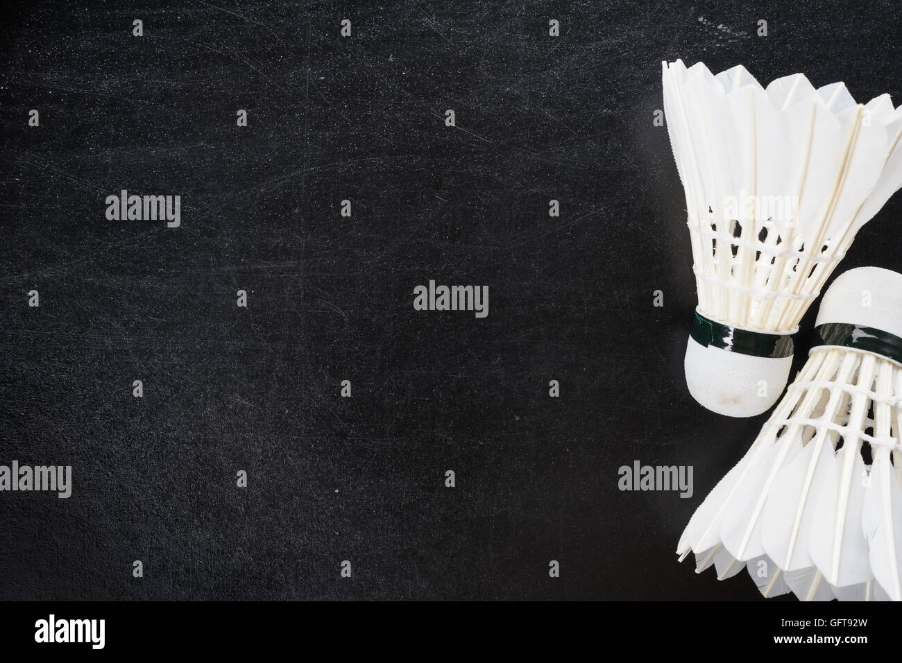 black board background with shuttlecocks Stock Photo - Alamy