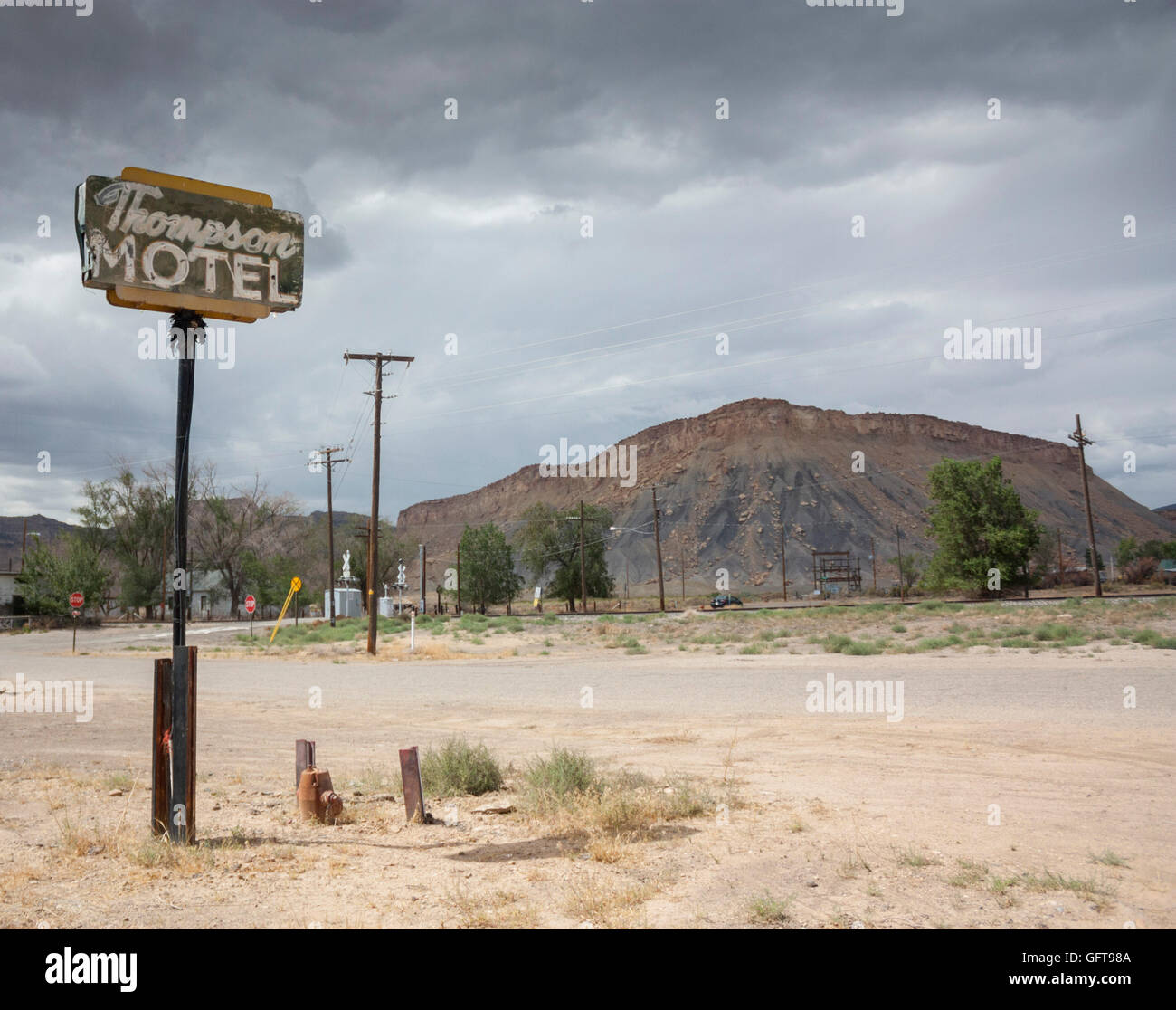 old Thompson Motel sign in Thompson Utah USA in front of mountain on a ...