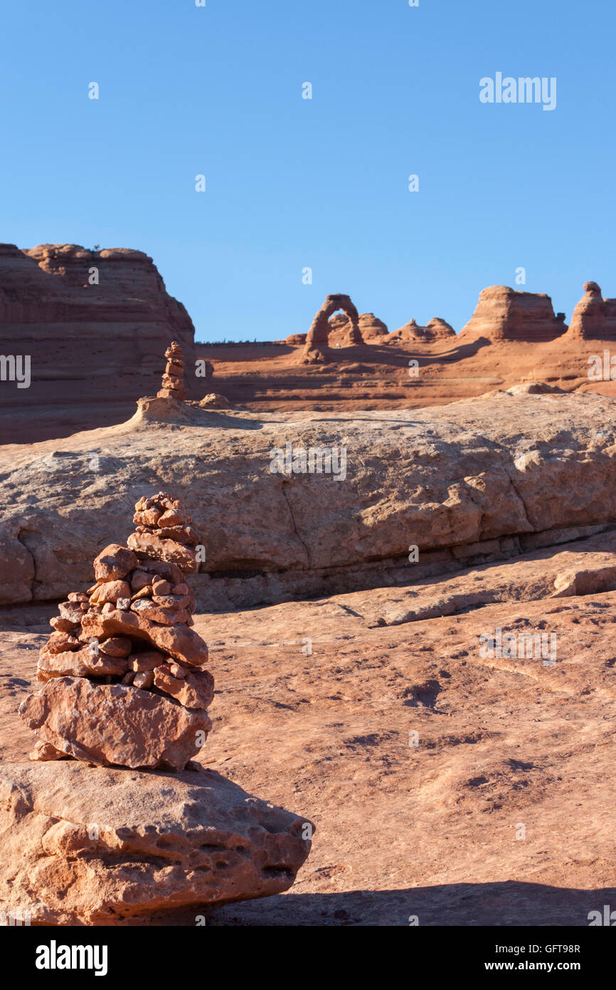 balanced rocks in front of natural arch formation Stock Photo - Alamy