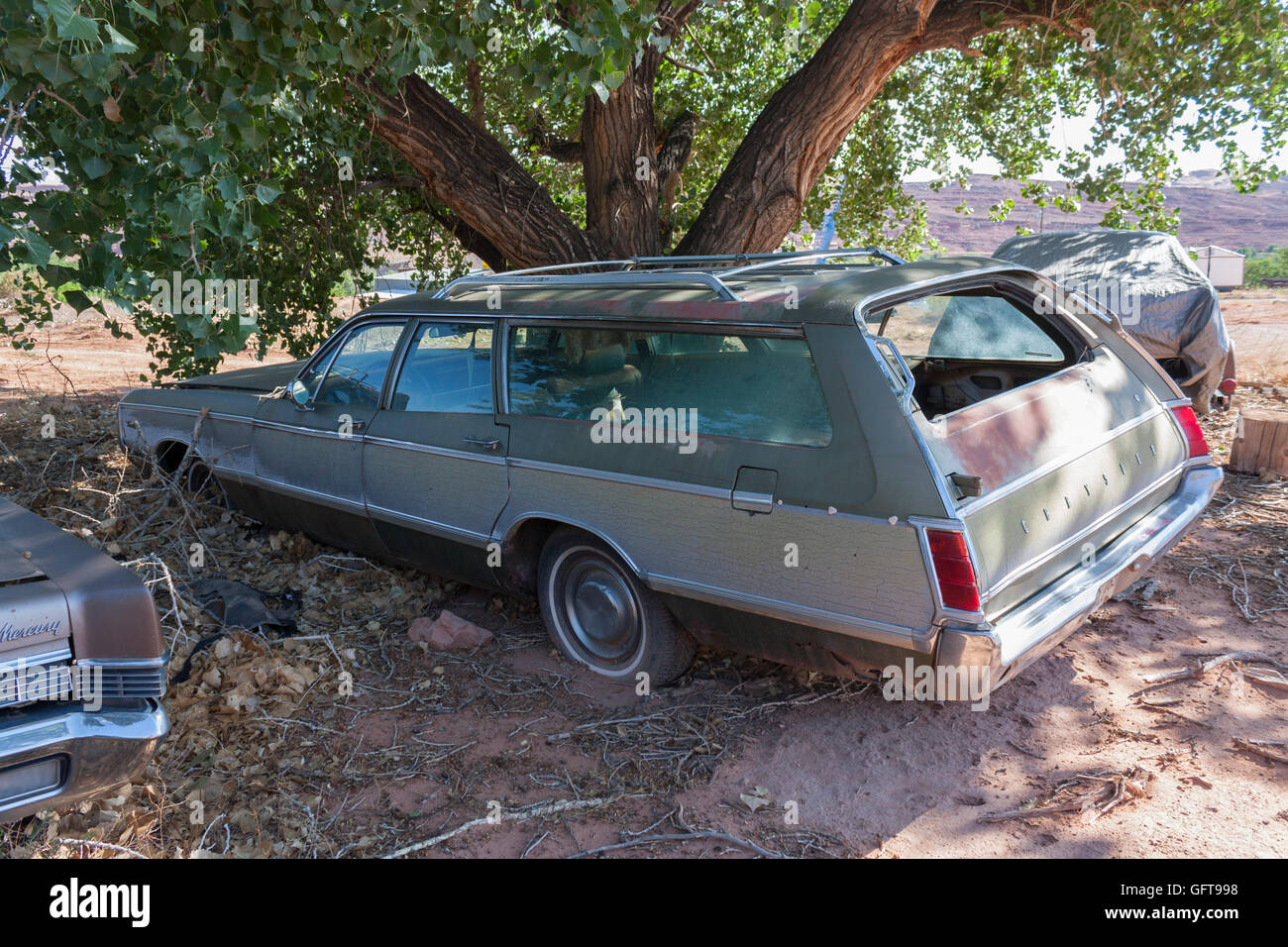 wrecked 1960s Chrysler station wagon in junkyard Stock Photo - Alamy