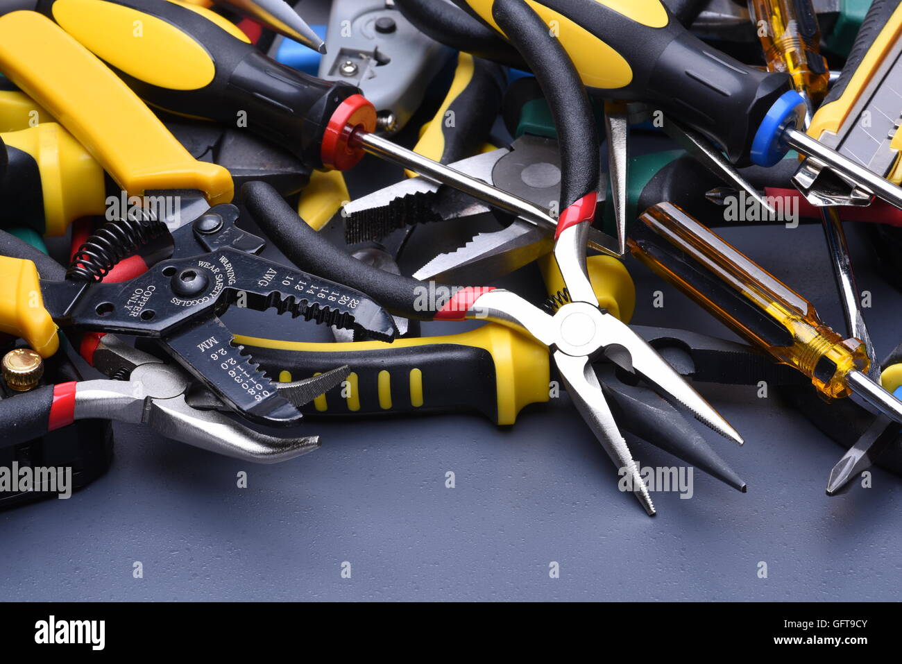 Set of tools to electrical installations on metal background Stock ...