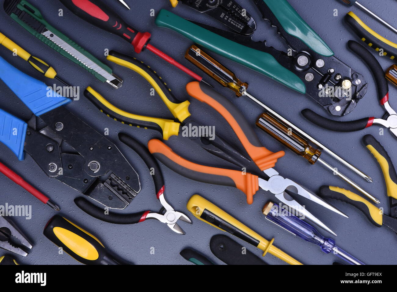 Set of tools to electrical installations on metal background Stock ...