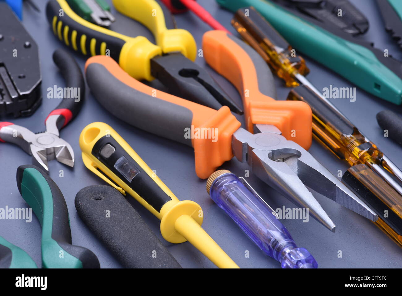 Set of tools to electrical installations on metal background Stock ...