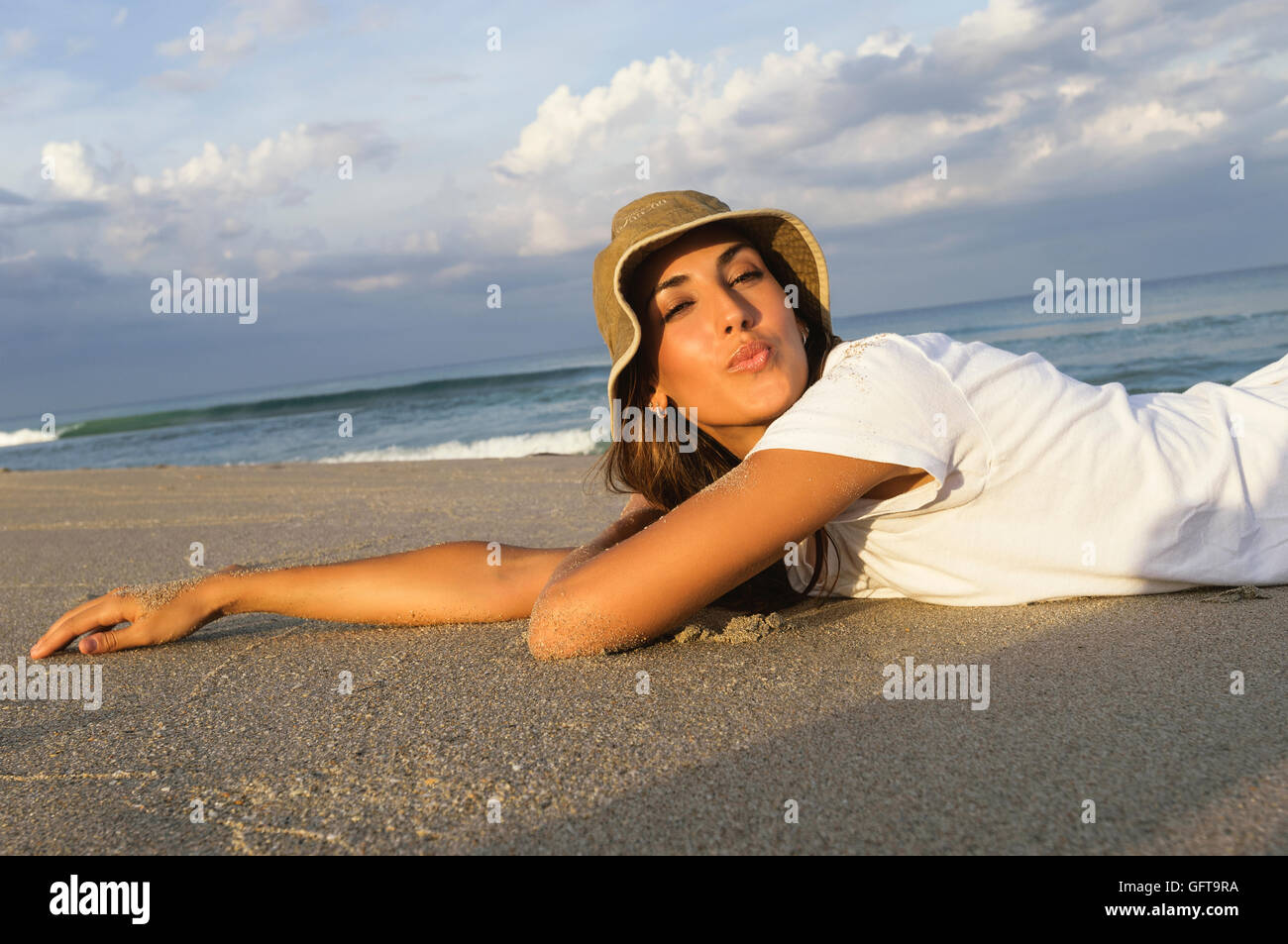Playing at the beach. Healthy beach holiday lifestyle Stock Photo - Alamy