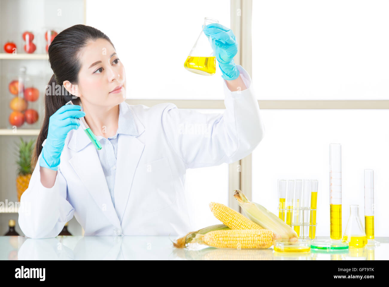 female scientist looking for new genetic modification in laboratory ...