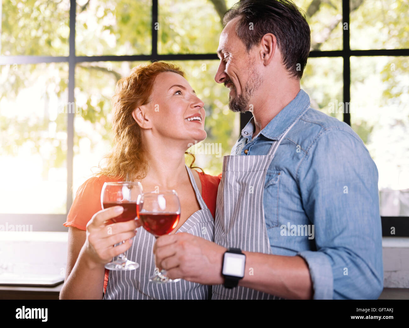 Man and woman looking in eyes Stock Photo - Alamy