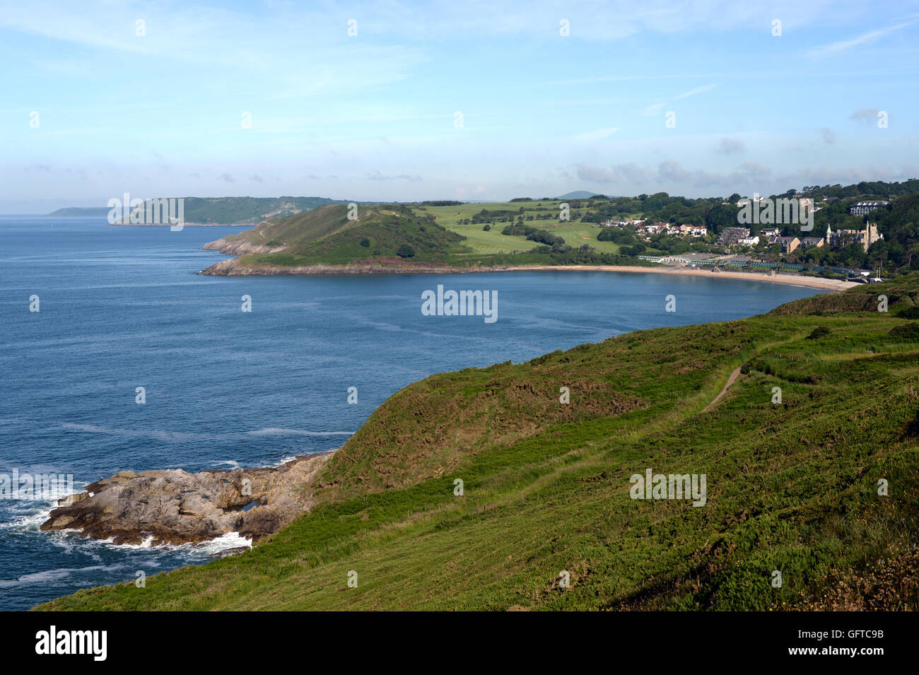 coast path views of sheltered bay and headlands at Langland , Gower ...