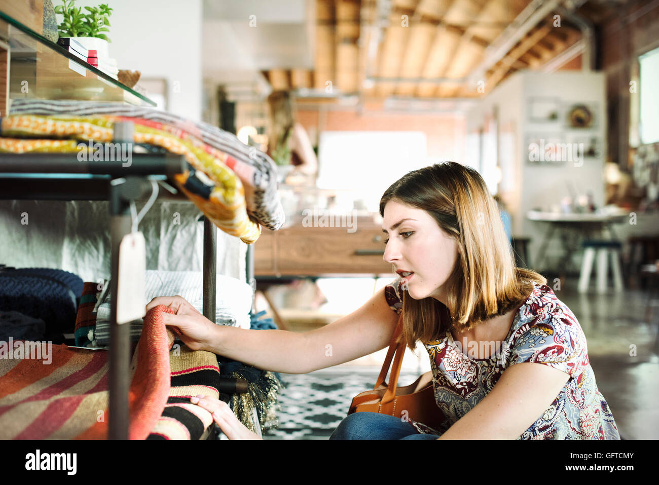 Woman and shelf hi-res stock photography and images - Alamy