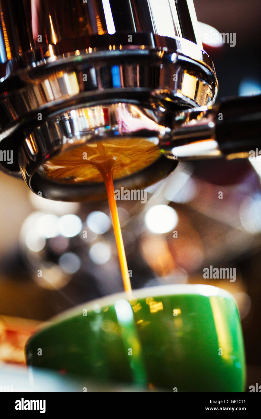 Freshly brewed coffee flowing into a coffee cup Stock Photo - Alamy