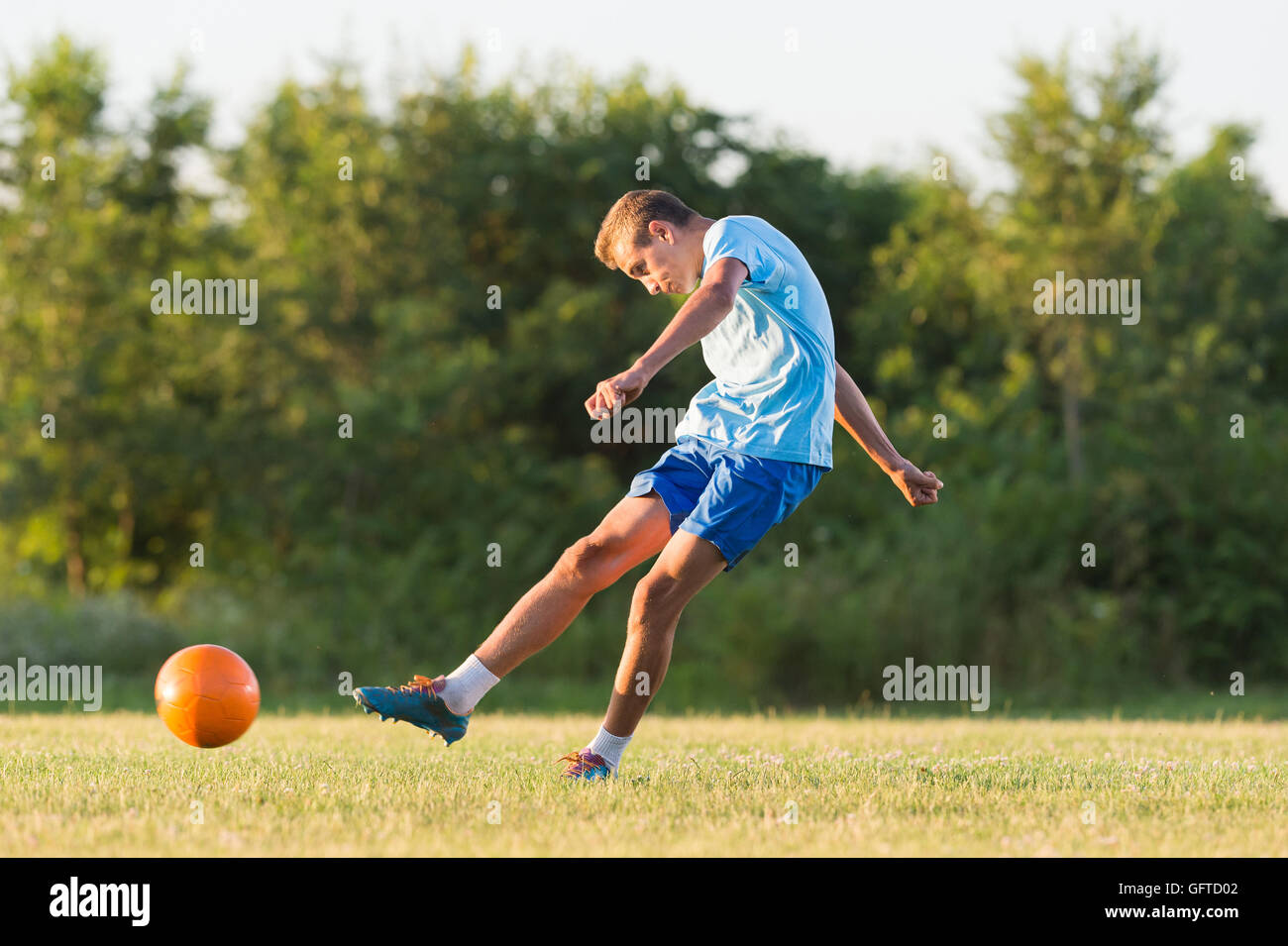 Children playing soccer on the court hi-res stock photography and ...