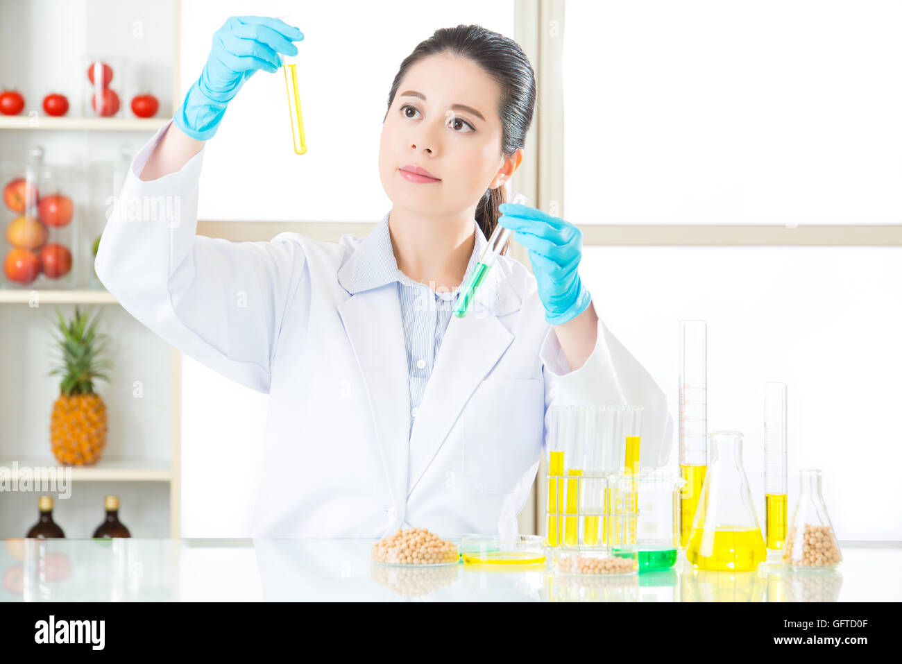 female scientist looking for new genetic modification in laboratory ...