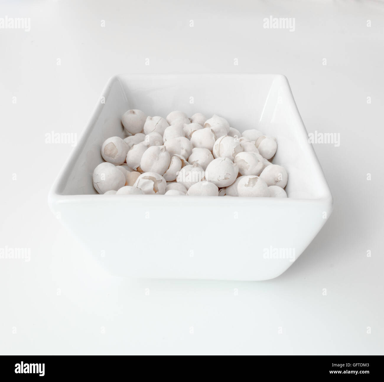 White chickpeas isolated on white background Stock Photo - Alamy