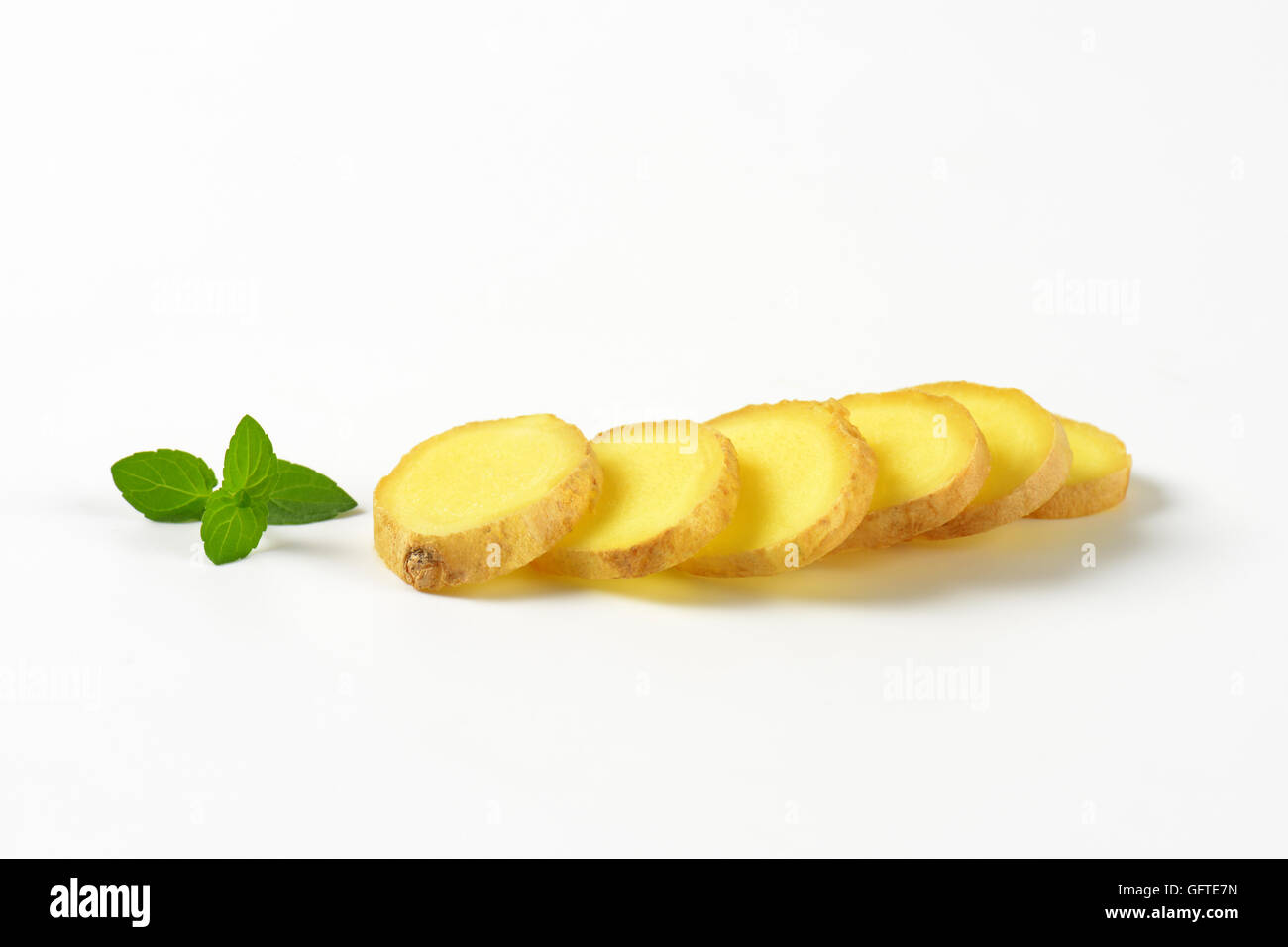 Ginger root and slices Cut Out Stock Images & Pictures - Alamy