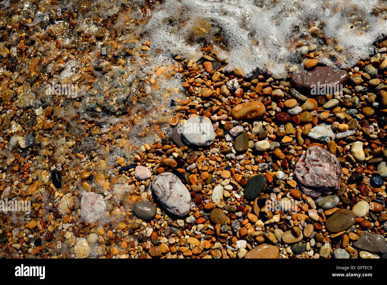 Stones on a beach Stock Photo - Alamy