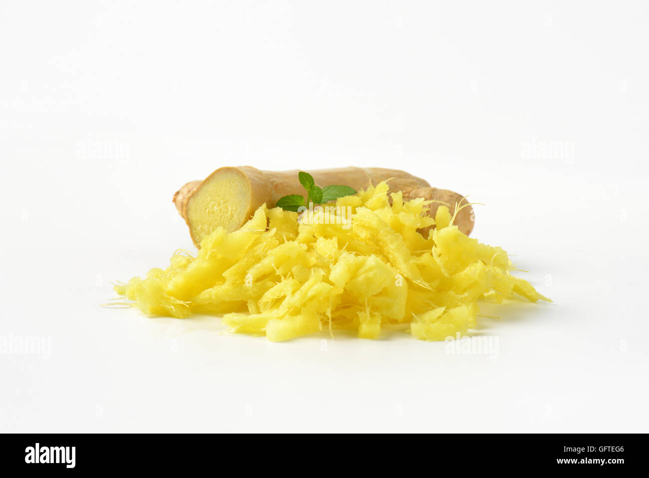 whole and grated fresh ginger on white background Stock Photo - Alamy