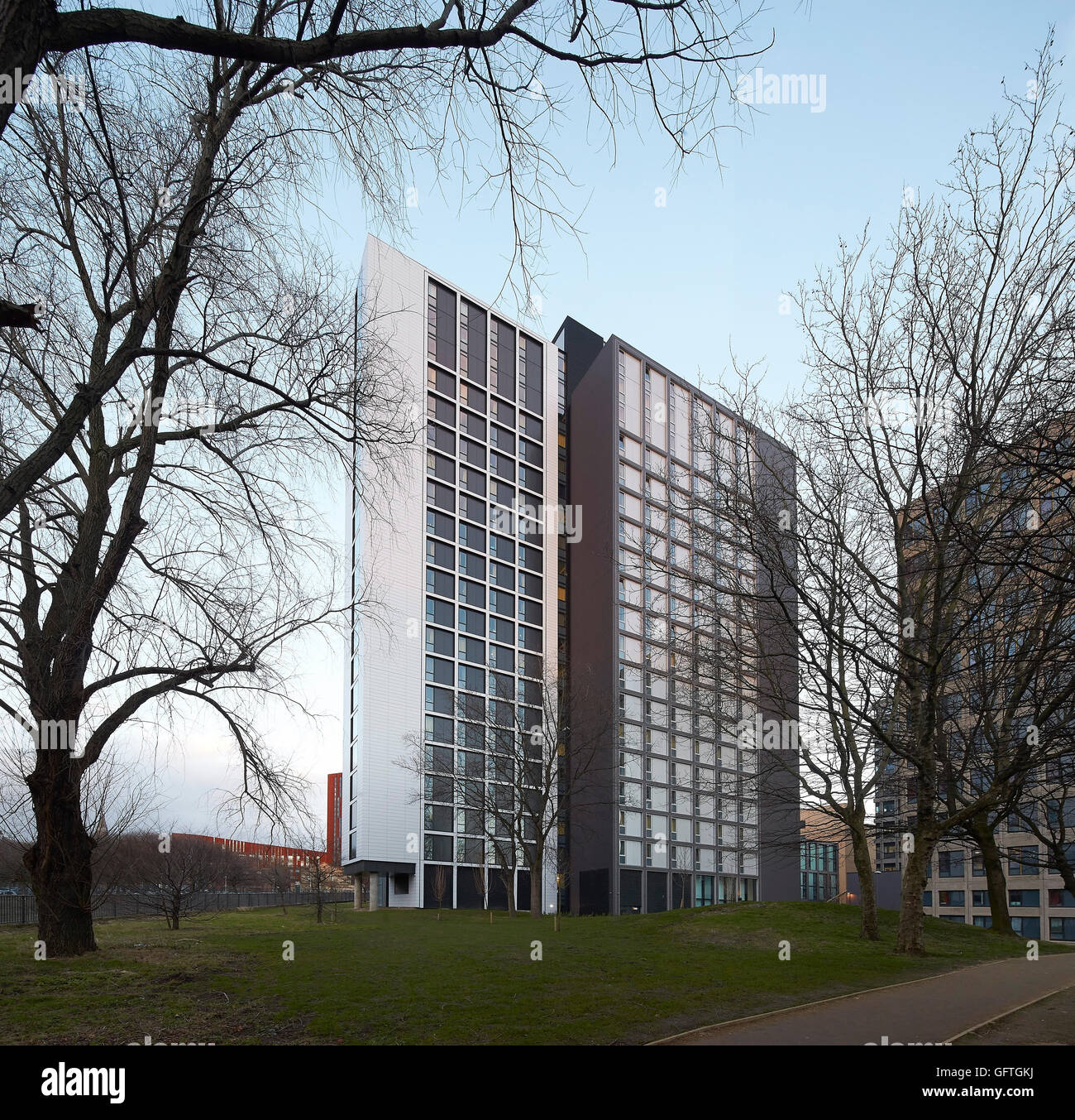 View across public green towards 21-story high-rise. Leeds Central ...