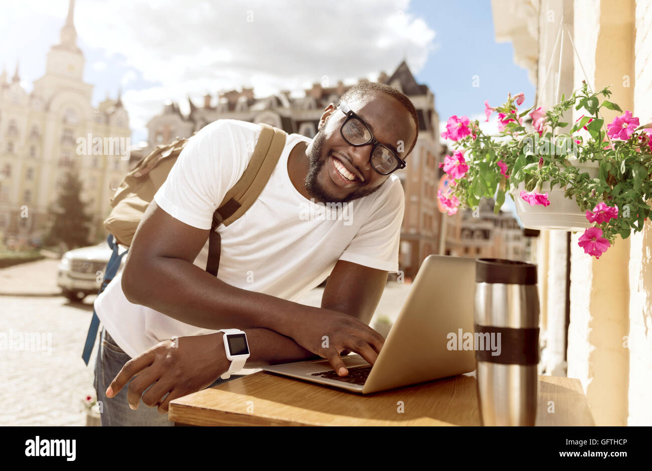 Man laptop cheerful table smile hi-res stock photography and images - Alamy